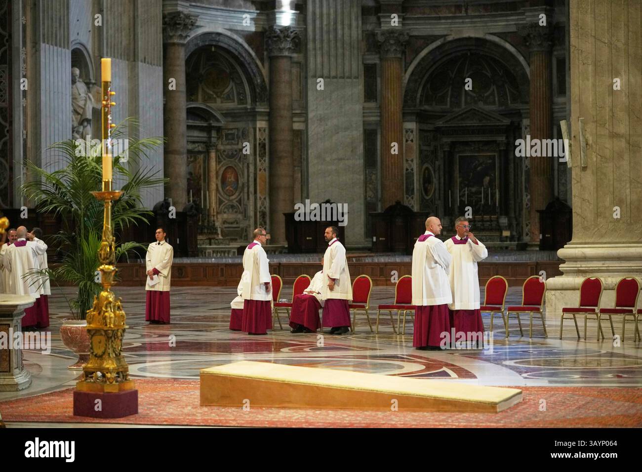 Staff make final preparations in St. Peter's Basilica ahead of the ...