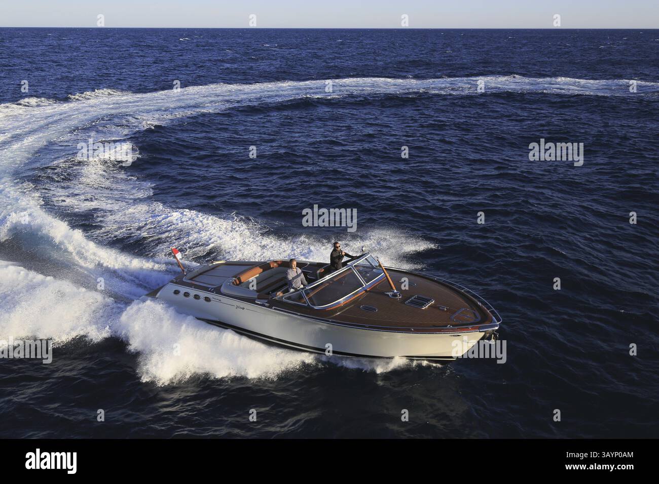 Aerial view sports boat J Craft 42 Torpedo R at full speed on the Cote ...