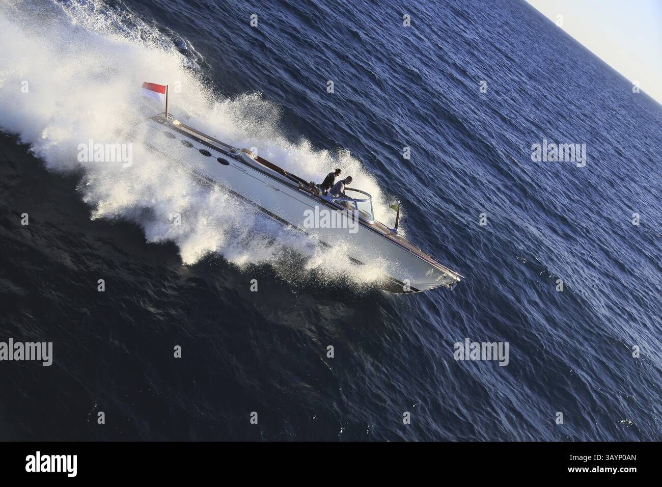 Aerial view sports boat J Craft 42 Torpedo R at full speed on the Cote ...