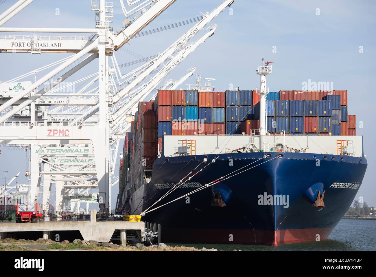 Intermodal shipping containers sit in the Oakland port just across the ...