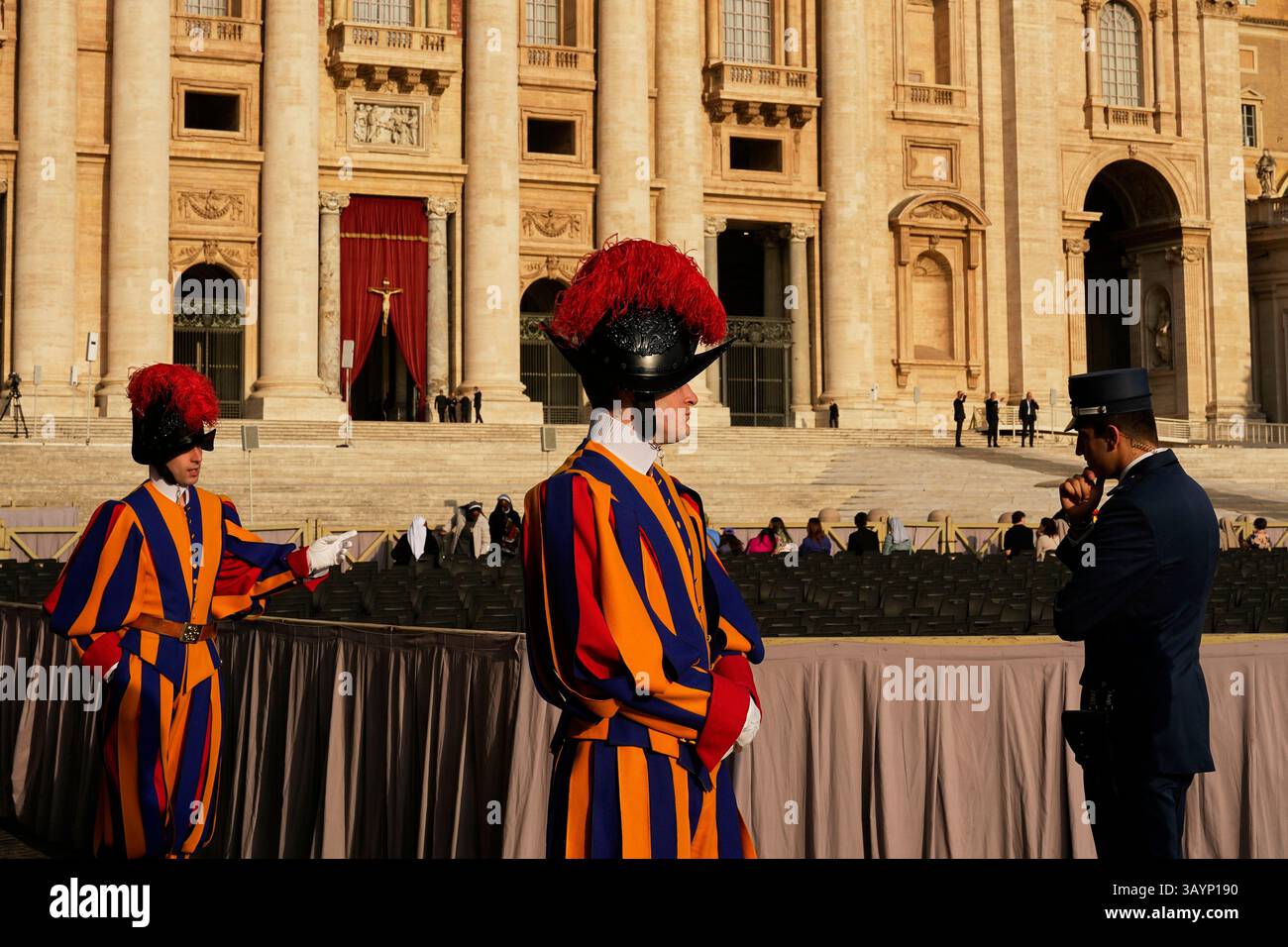 Pontifical Swiss guards stand in St. Peter's Square before the arrival ...