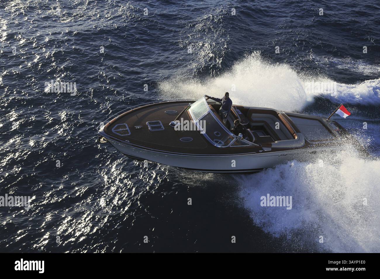 Aerial view sports boat J Craft 42 Torpedo R at full speed on the Cote ...