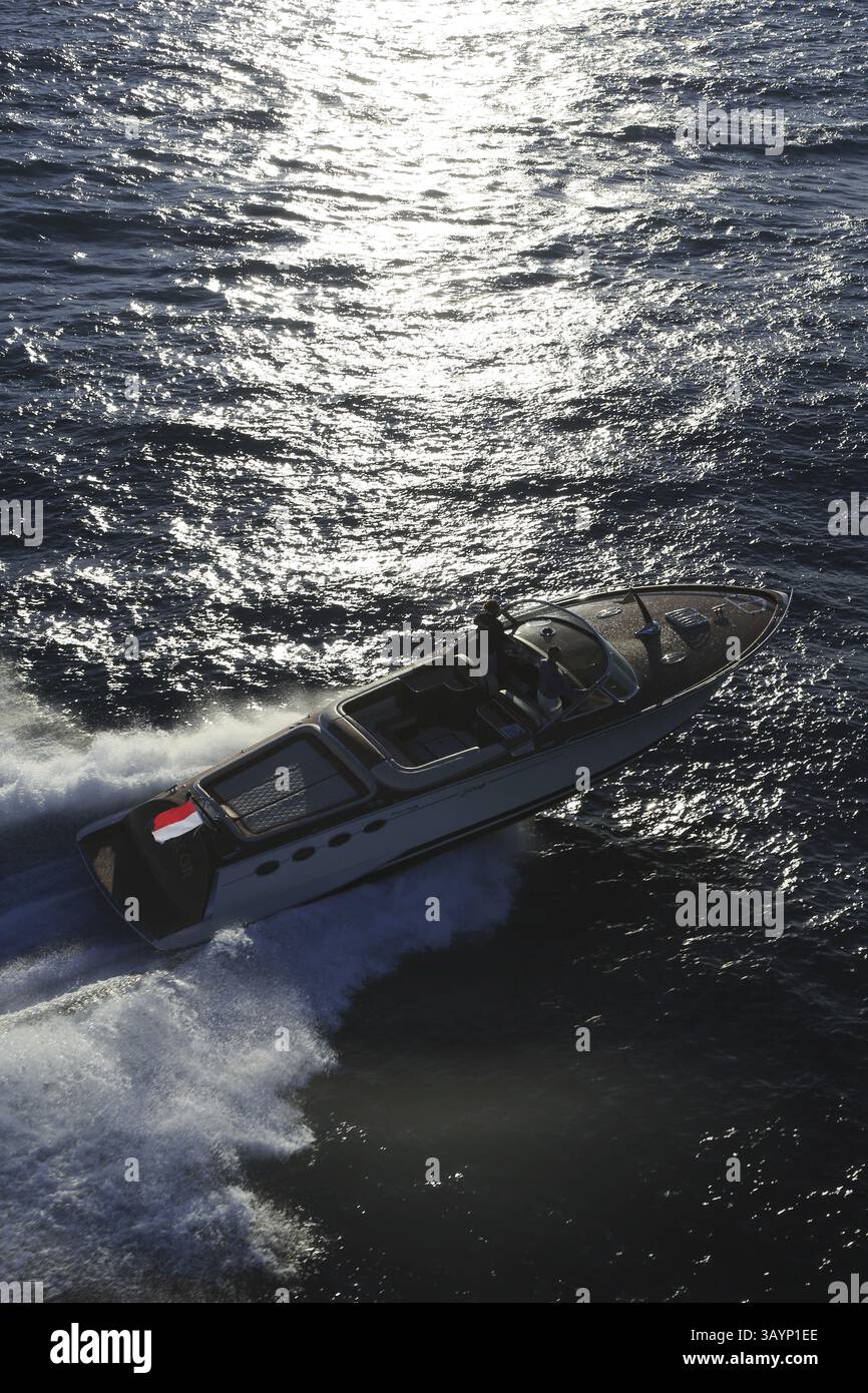 Aerial view sports boat J Craft 42 Torpedo R at full speed on the Cote ...