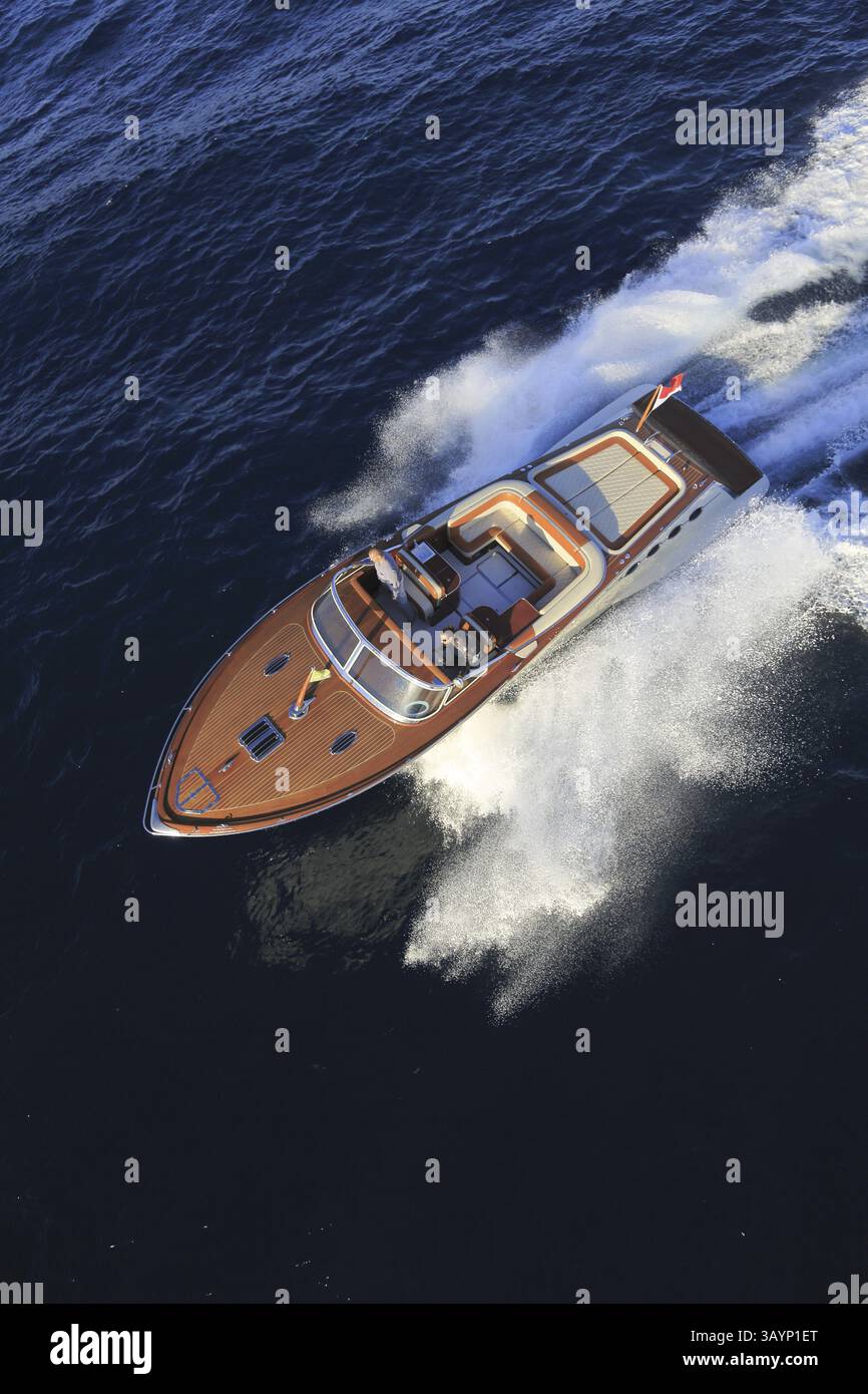 Aerial view sports boat J Craft 42 Torpedo R at full speed on the Cote ...