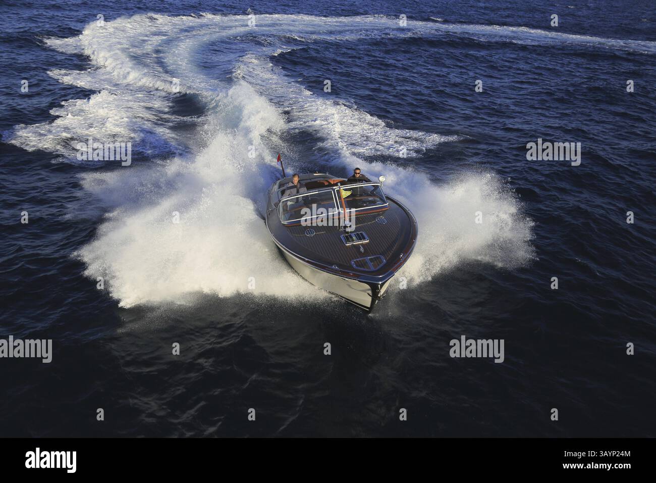 Aerial view sports boat J Craft 42 Torpedo R at full speed on the Cote ...