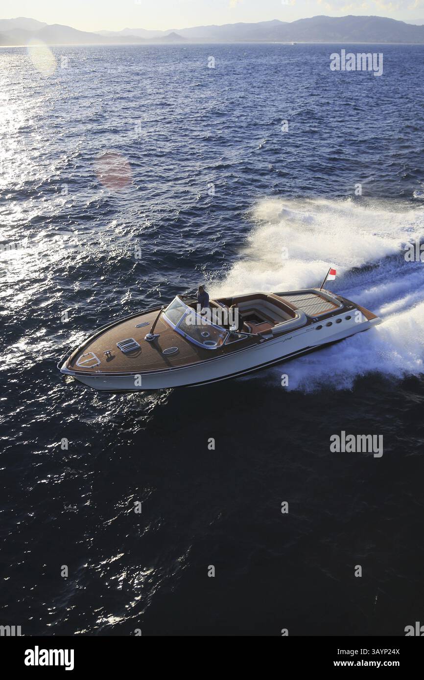 Aerial view sports boat J Craft 42 Torpedo R at full speed on the Cote ...