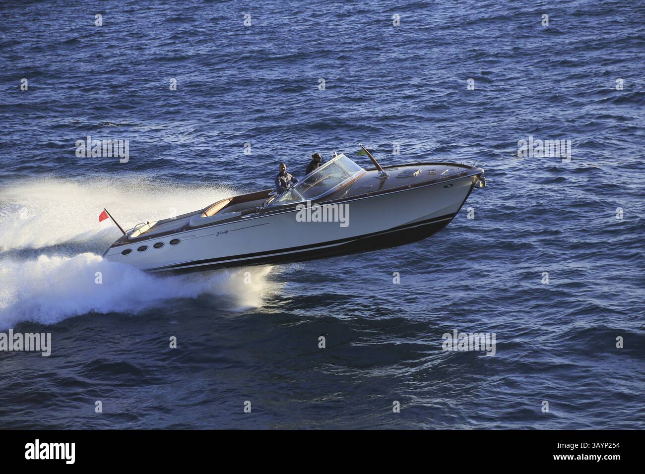 Aerial view sports boat J Craft 42 Torpedo R at full speed on the Cote ...