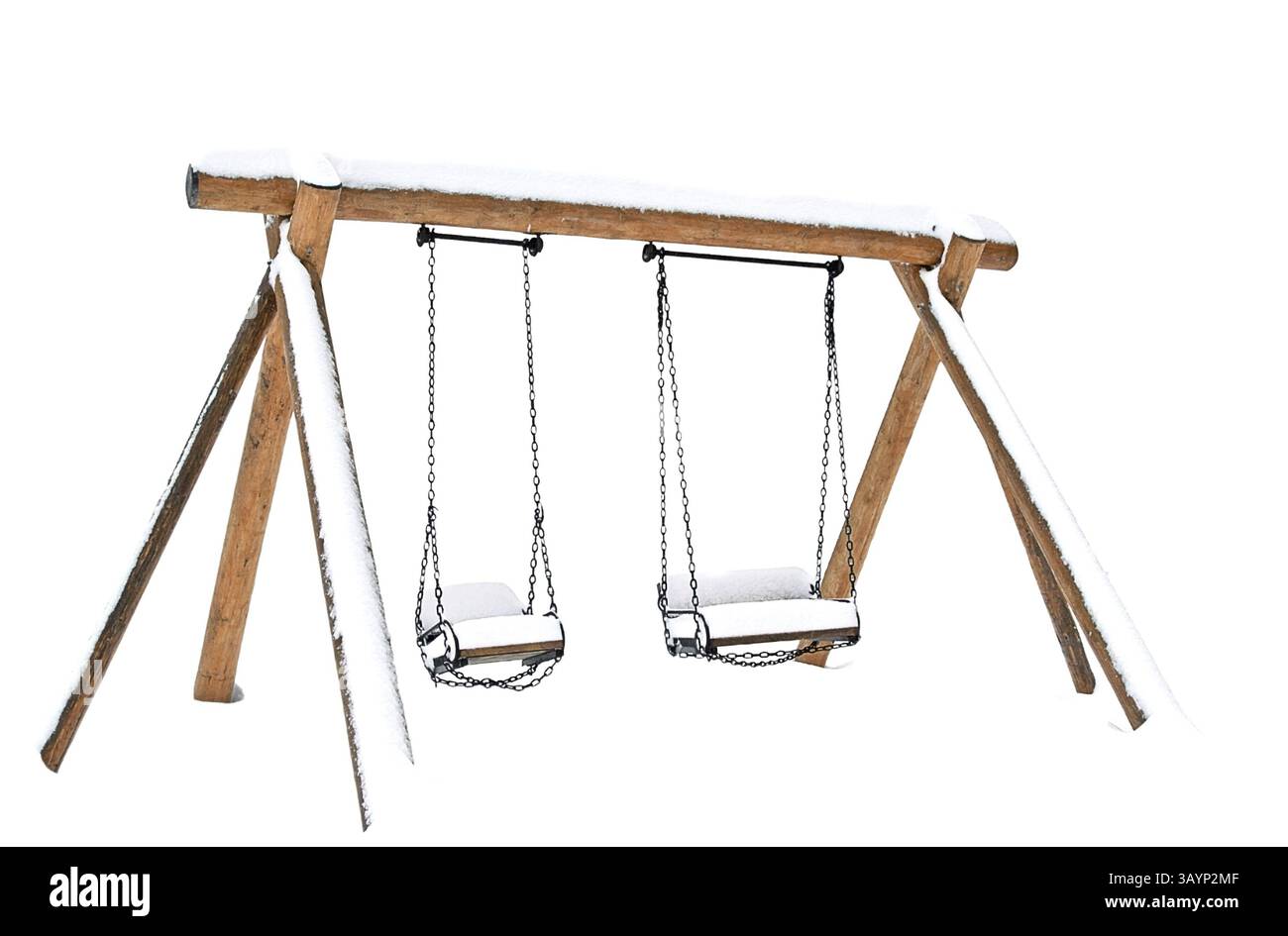 Swings covered with snow Stock Photo - Alamy