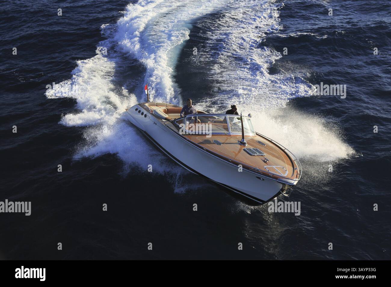 Aerial view sports boat J Craft 42 Torpedo R at full speed on the Cote ...