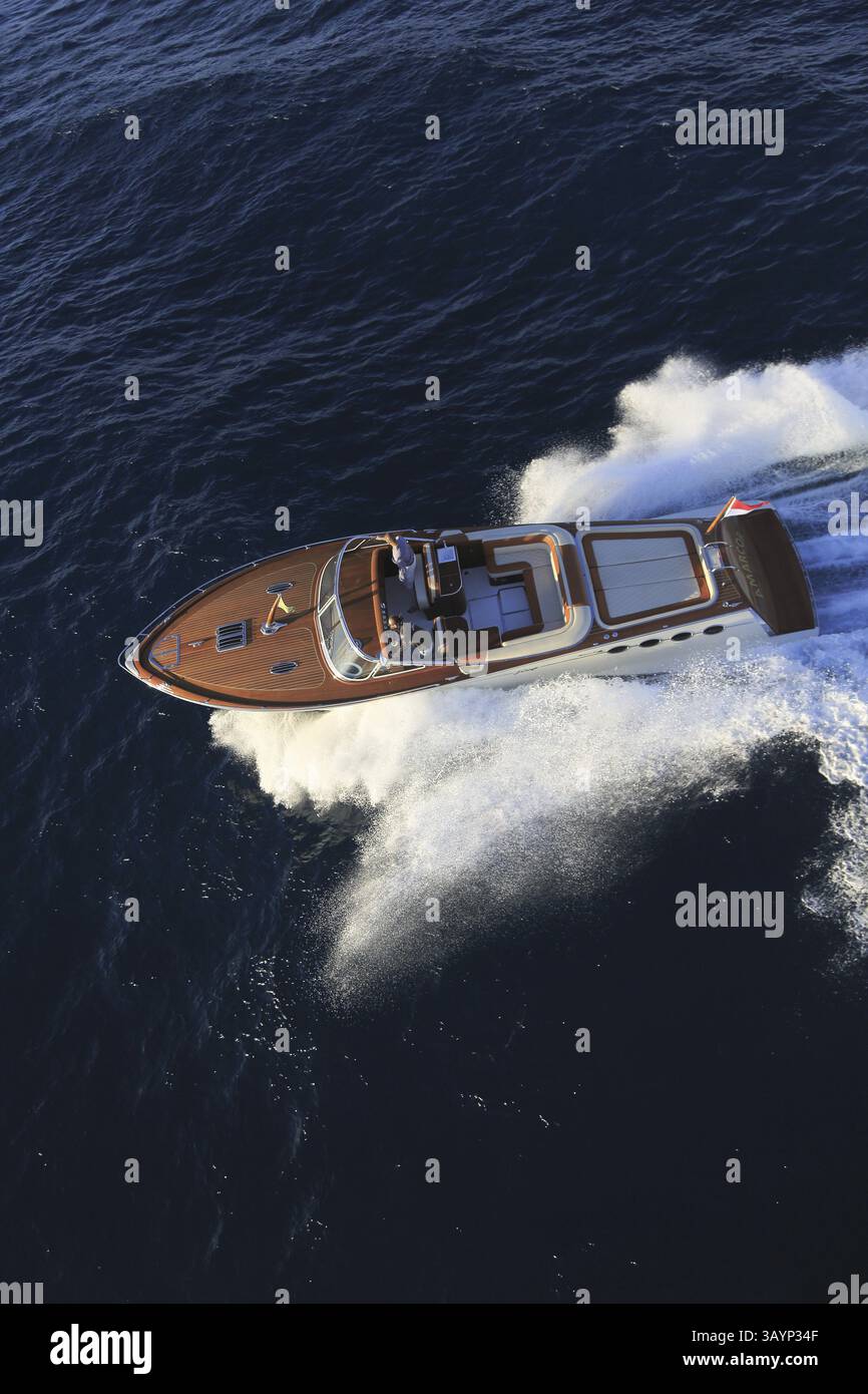 Aerial view sports boat J Craft 42 Torpedo R at full speed on the Cote ...
