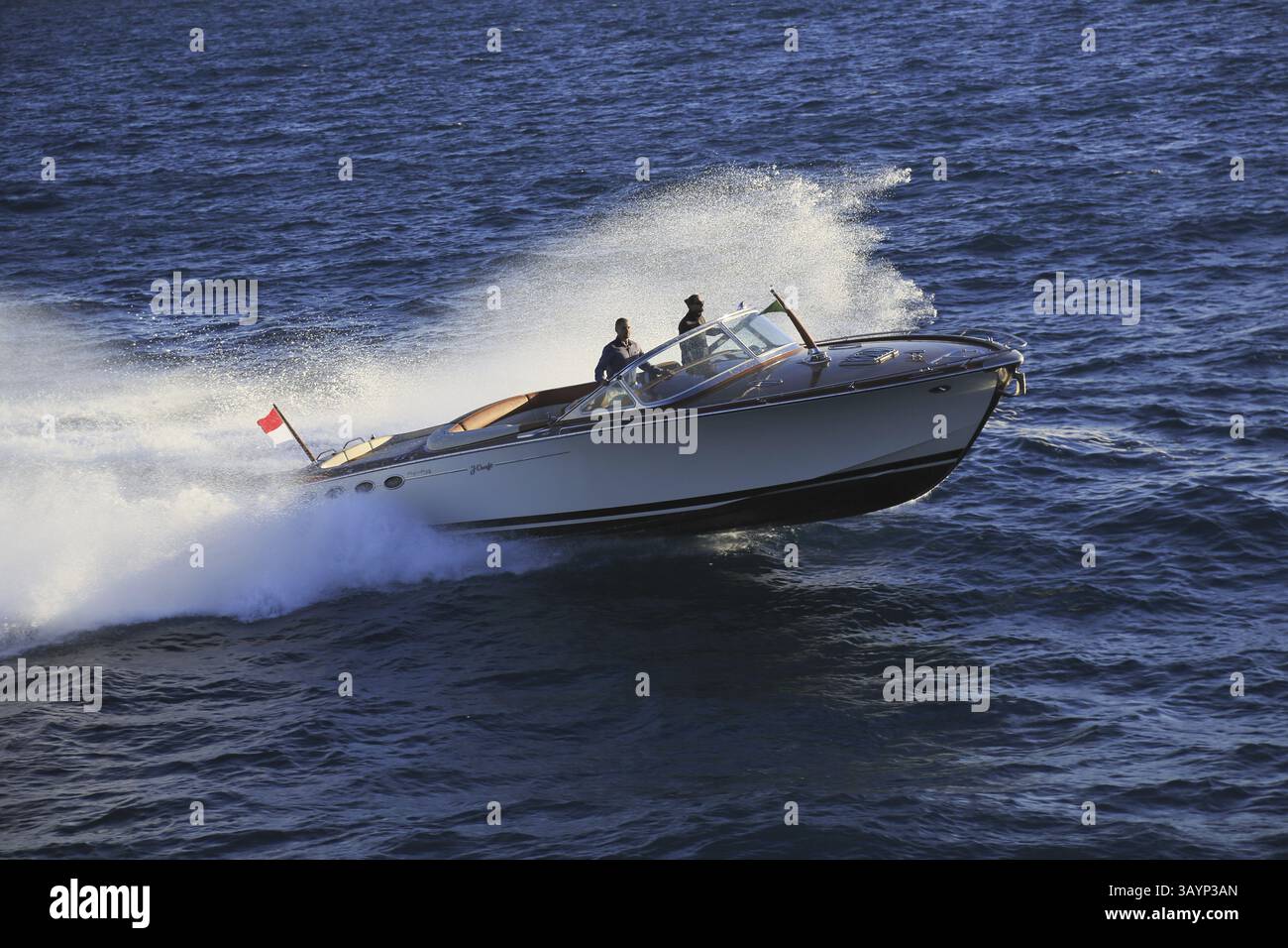 Aerial view sports boat J Craft 42 Torpedo R at full speed on the Cote ...