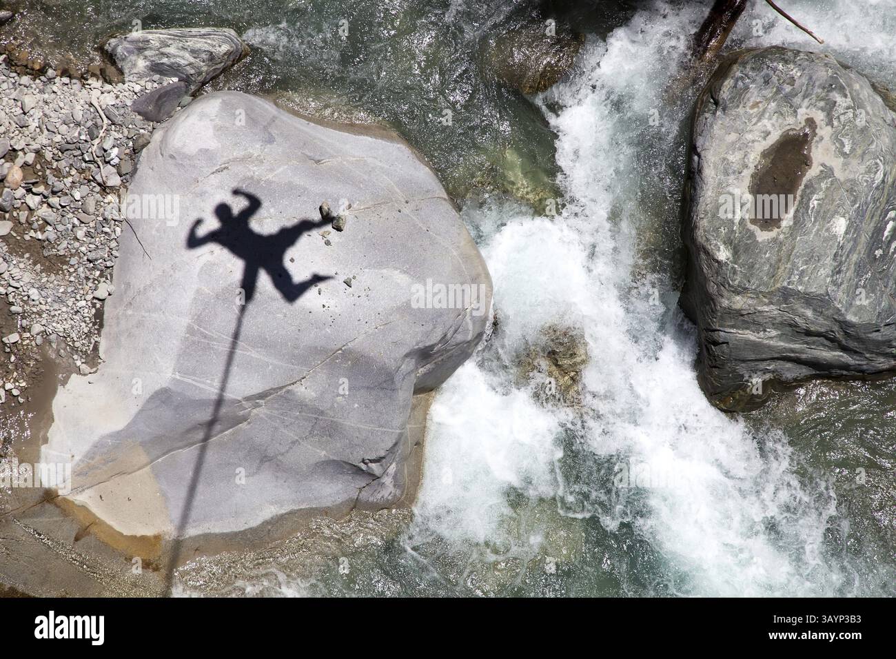 Falling bungee jumper shadow above the canyon and mountain river Stock ...