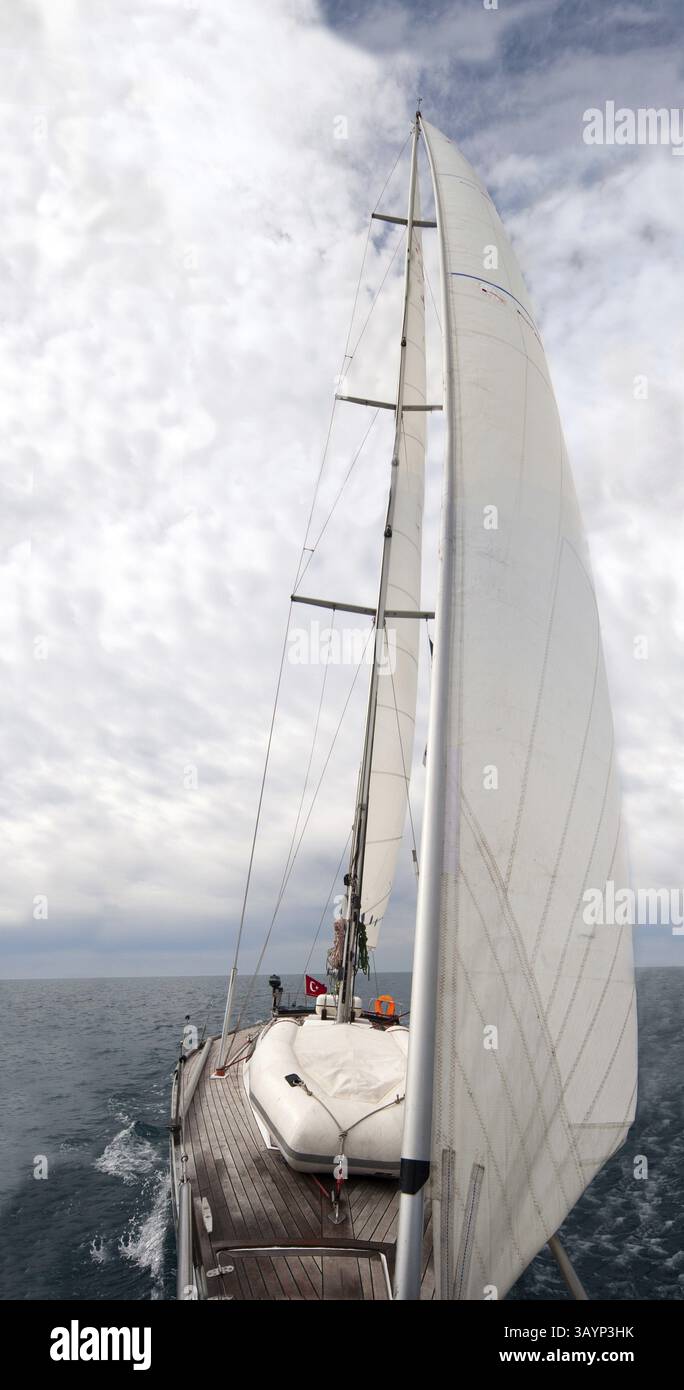 Front view of sailing boat with water splash Stock Photo - Alamy