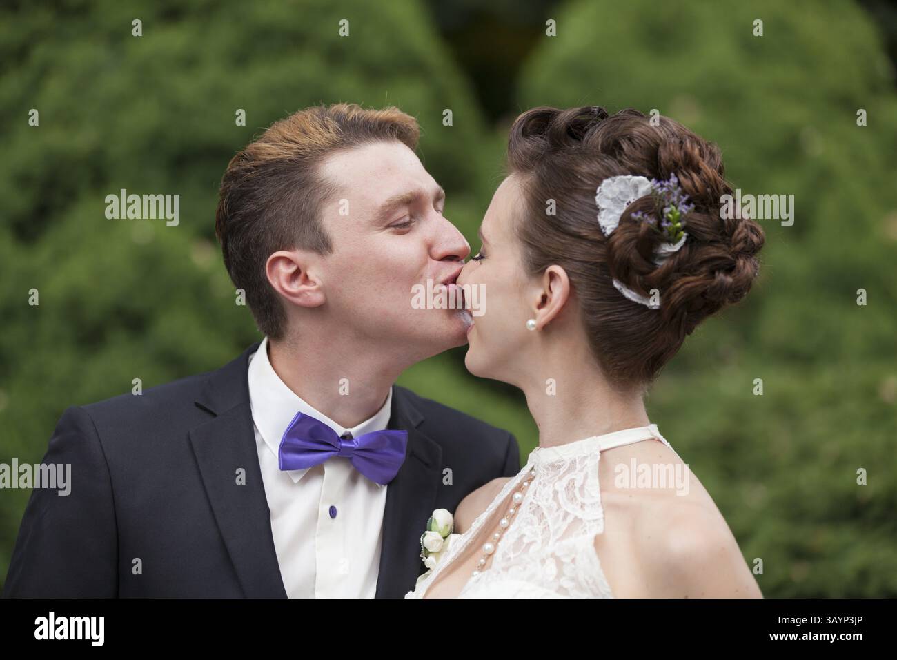 Just married couple kissing, closeup view Stock Photo - Alamy