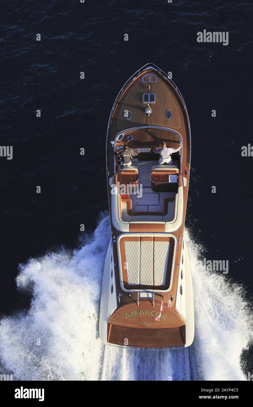 Aerial view sports boat J Craft 42 Torpedo R at full speed on the Cote ...