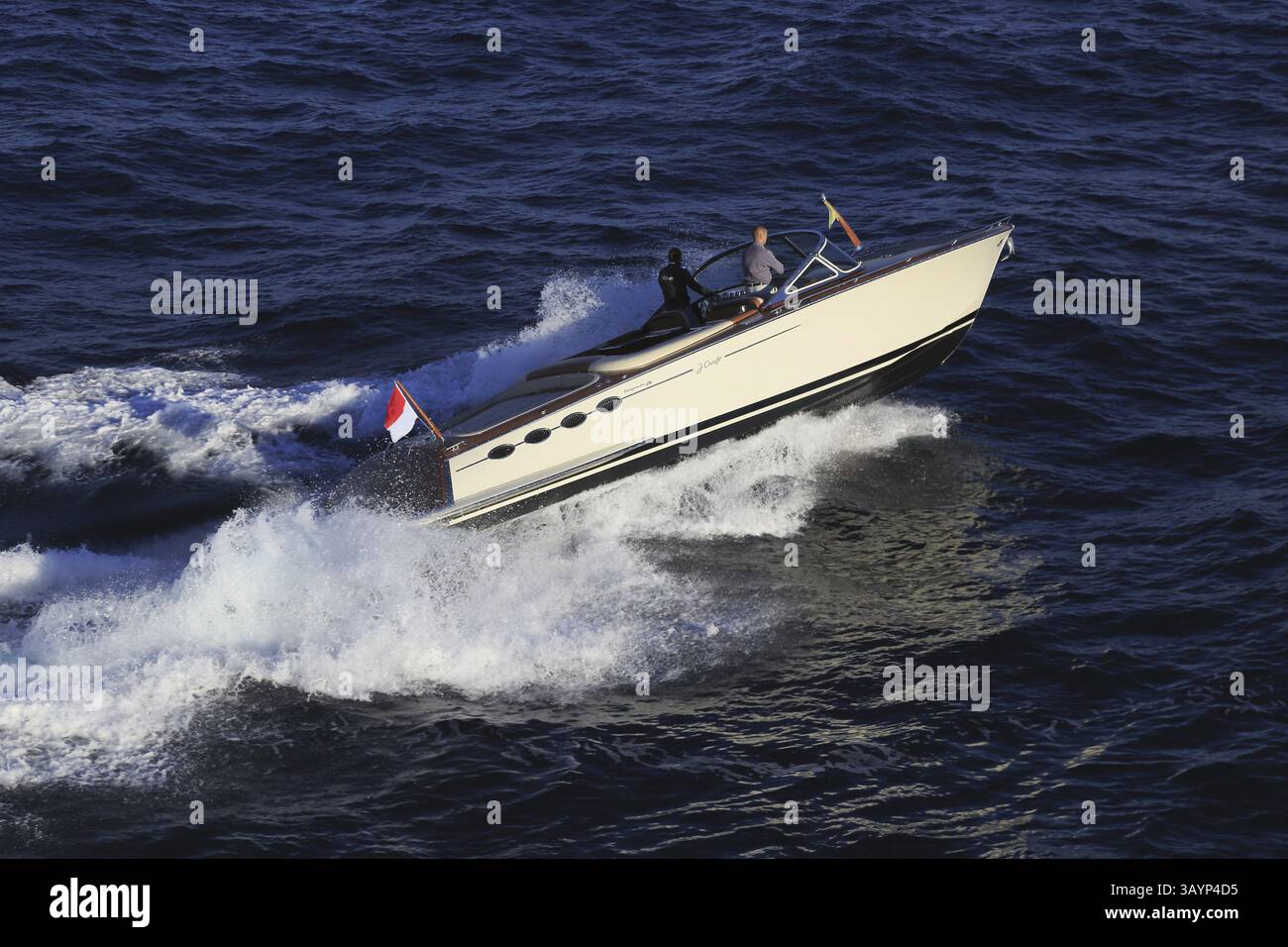 Aerial view sports boat J Craft 42 Torpedo R at full speed on the Cote ...