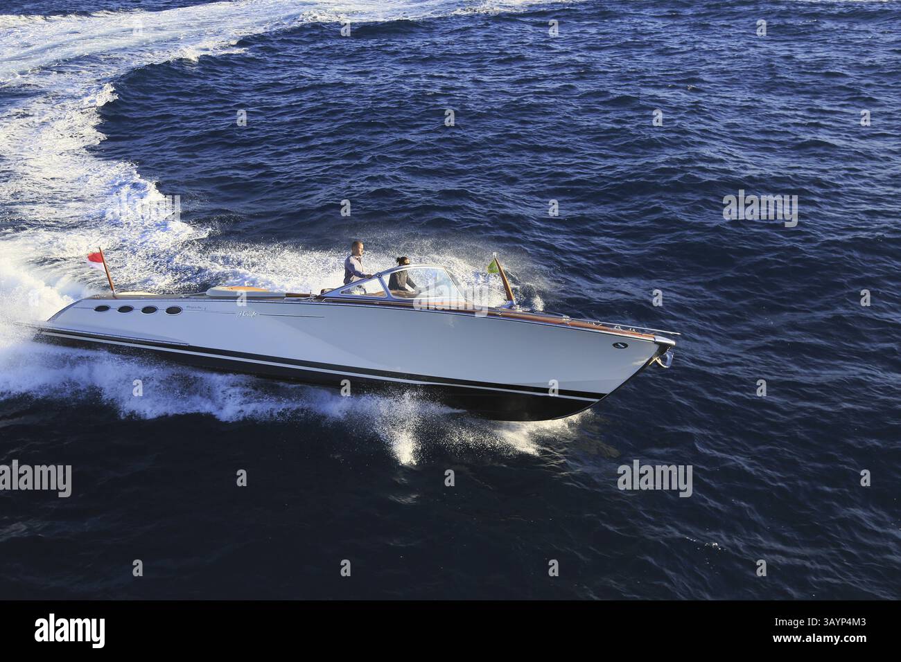 Aerial view sports boat J Craft 42 Torpedo R at full speed on the Cote ...