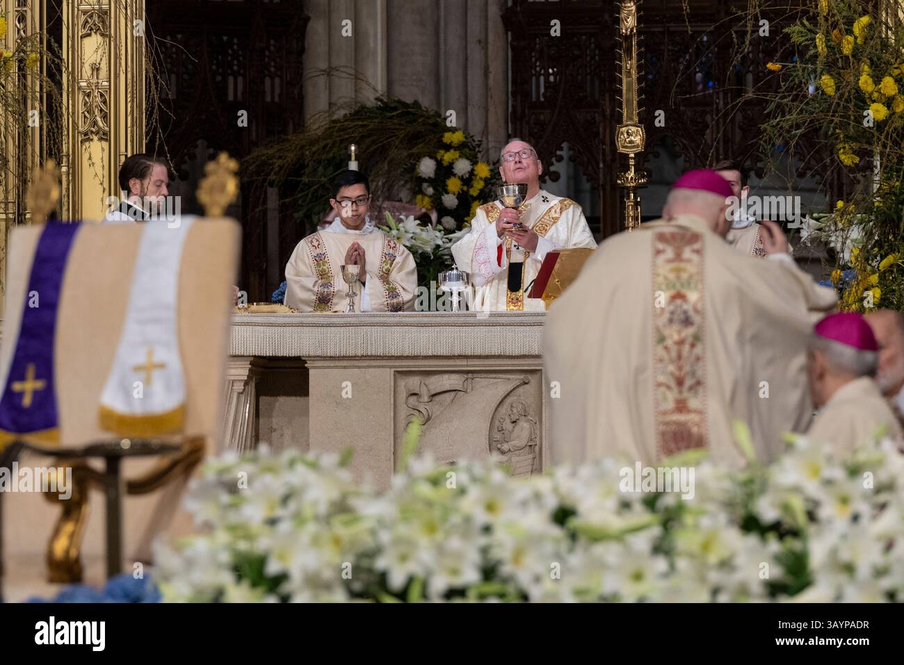 USA. 22nd Apr, 2025. Cardinal Timothy Dolan leads Mass for the late ...