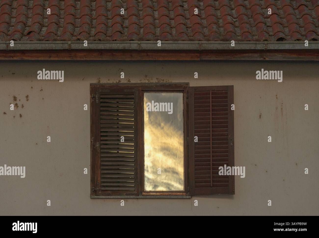 Golden Reflection: Morning Window Glow Stock Photo - Alamy
