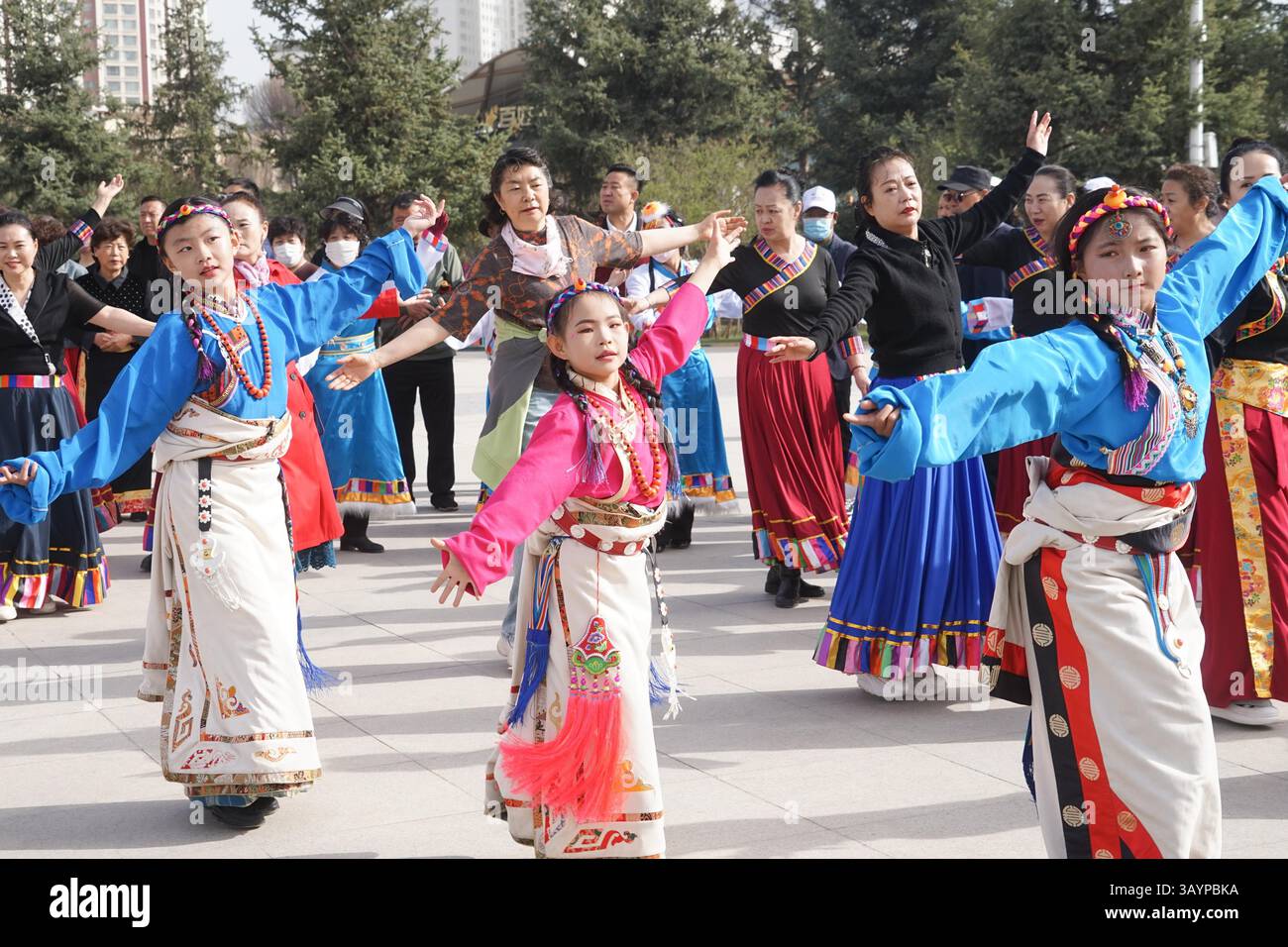 **CHINESE MAINLAND, HONG KONG, MACAU AND TAIWAN OUT** People perform ...