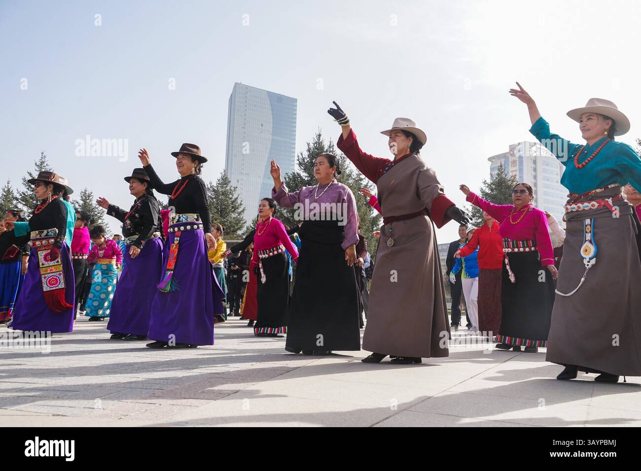 **CHINESE MAINLAND, HONG KONG, MACAU AND TAIWAN OUT** People perform ...