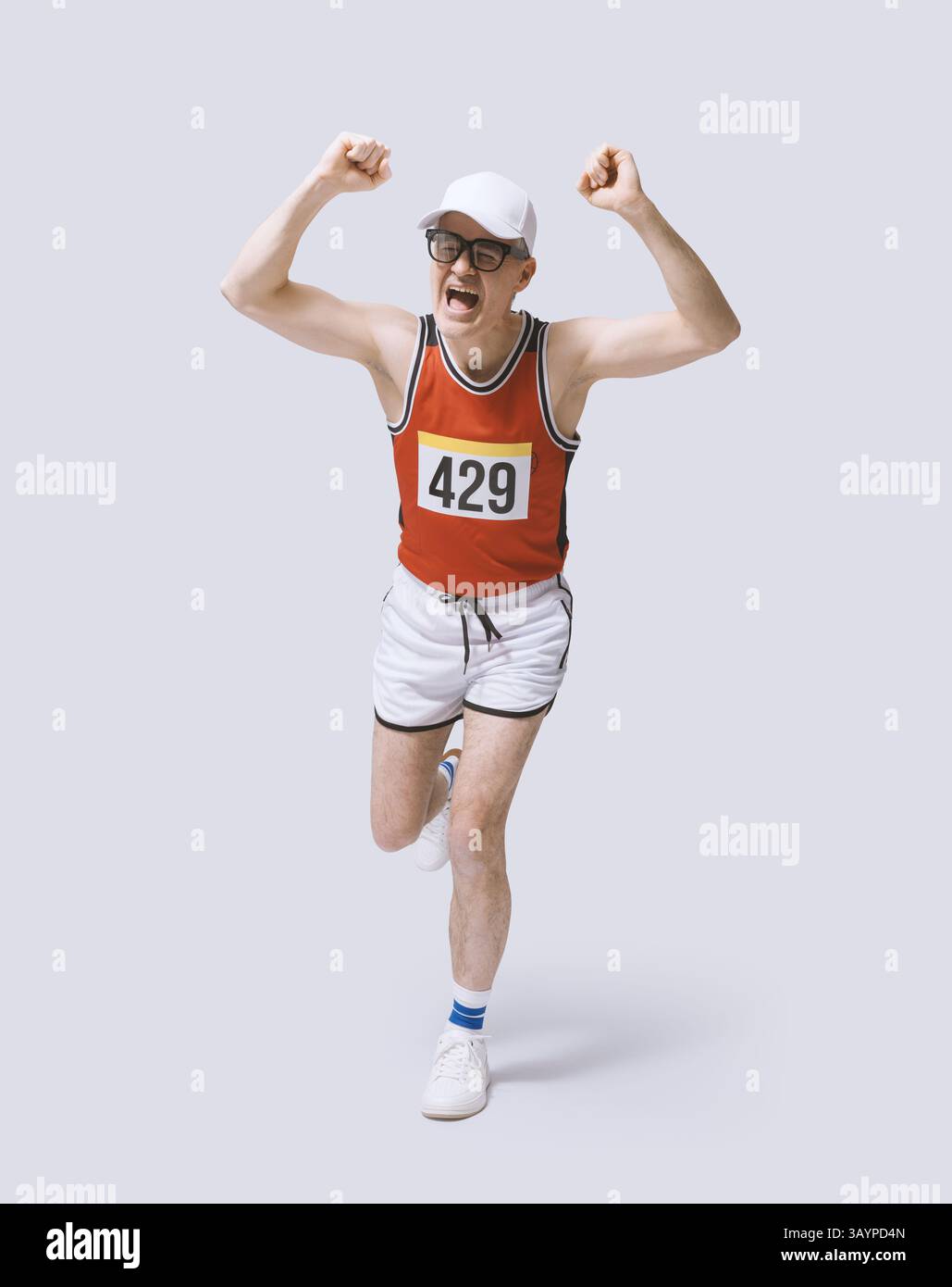 Cheerful happy runner crossing the finishing line and celebrating, full ...