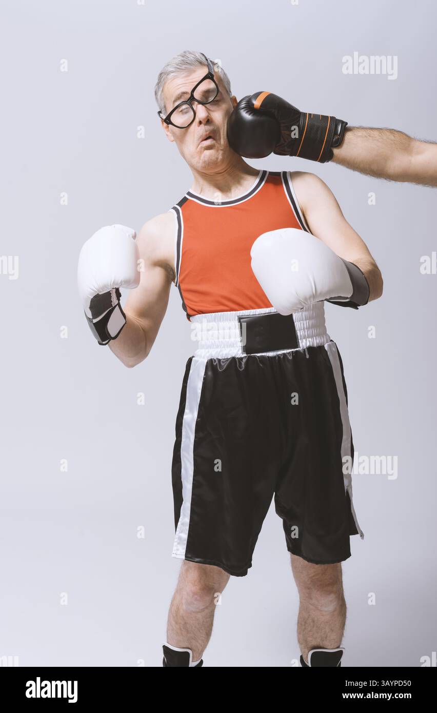 Funny nerdy guy with glasses getting punched on his face during a ...