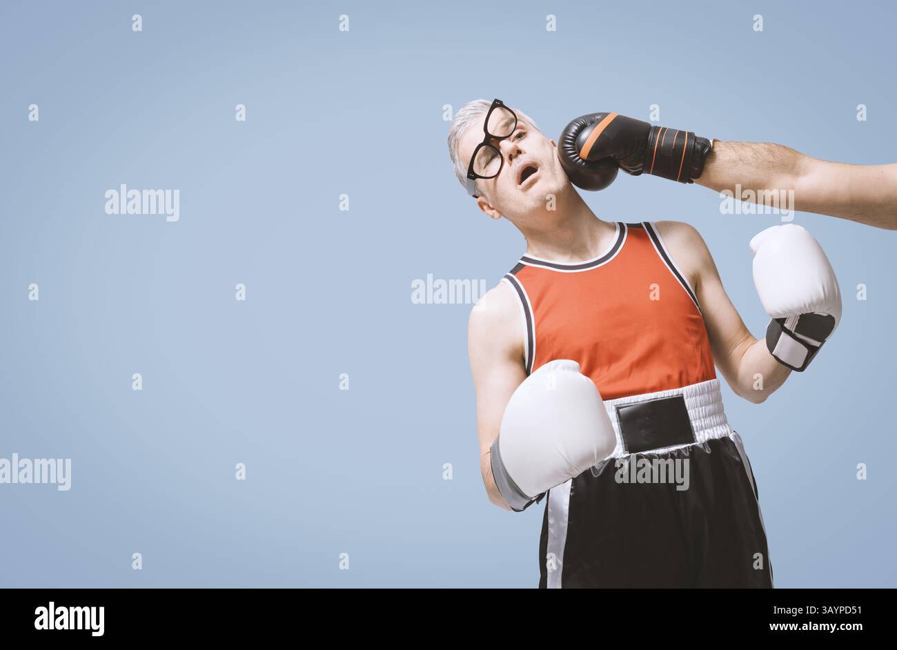 Funny nerdy guy with glasses getting punched on his face during a ...