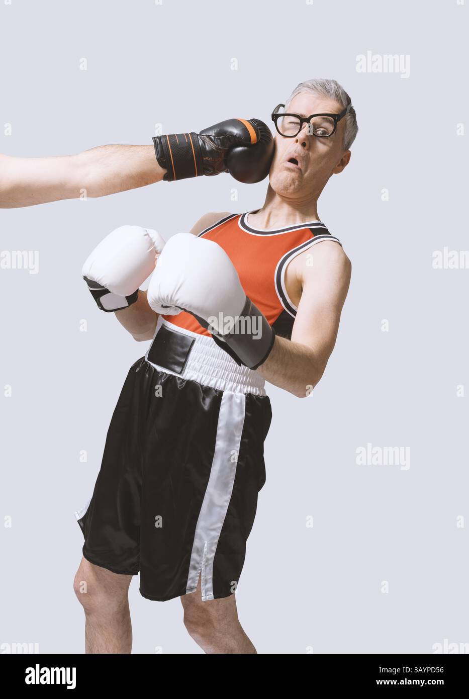 Funny nerdy guy with glasses getting punched on his face during a ...