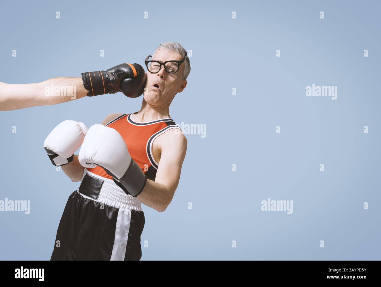 Funny nerdy guy with glasses getting punched on his face during a ...