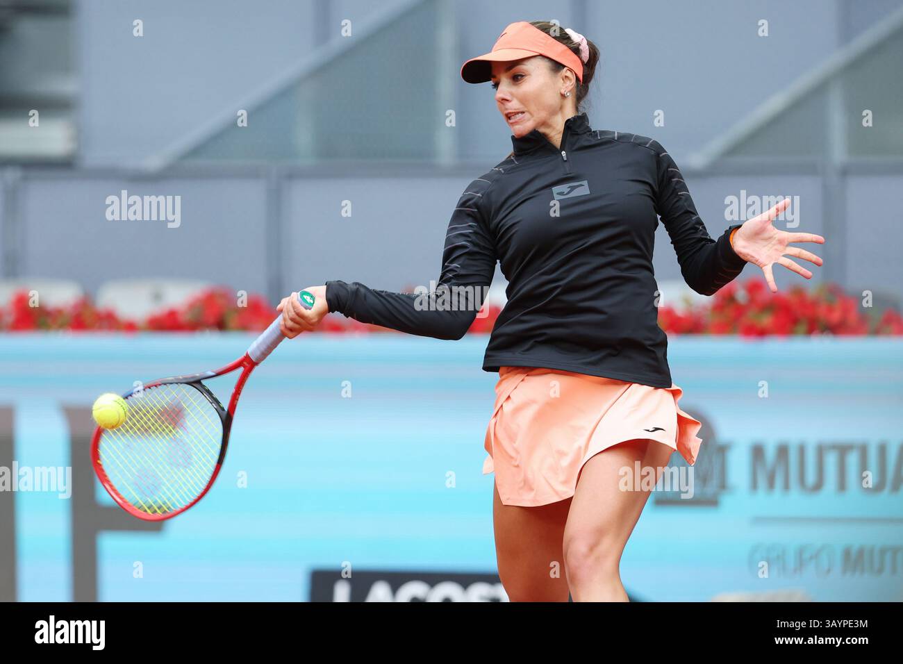 Viktoriya Tomova of Bulgaria in action against Alexandra Eala of Philippines during the Mutua ...