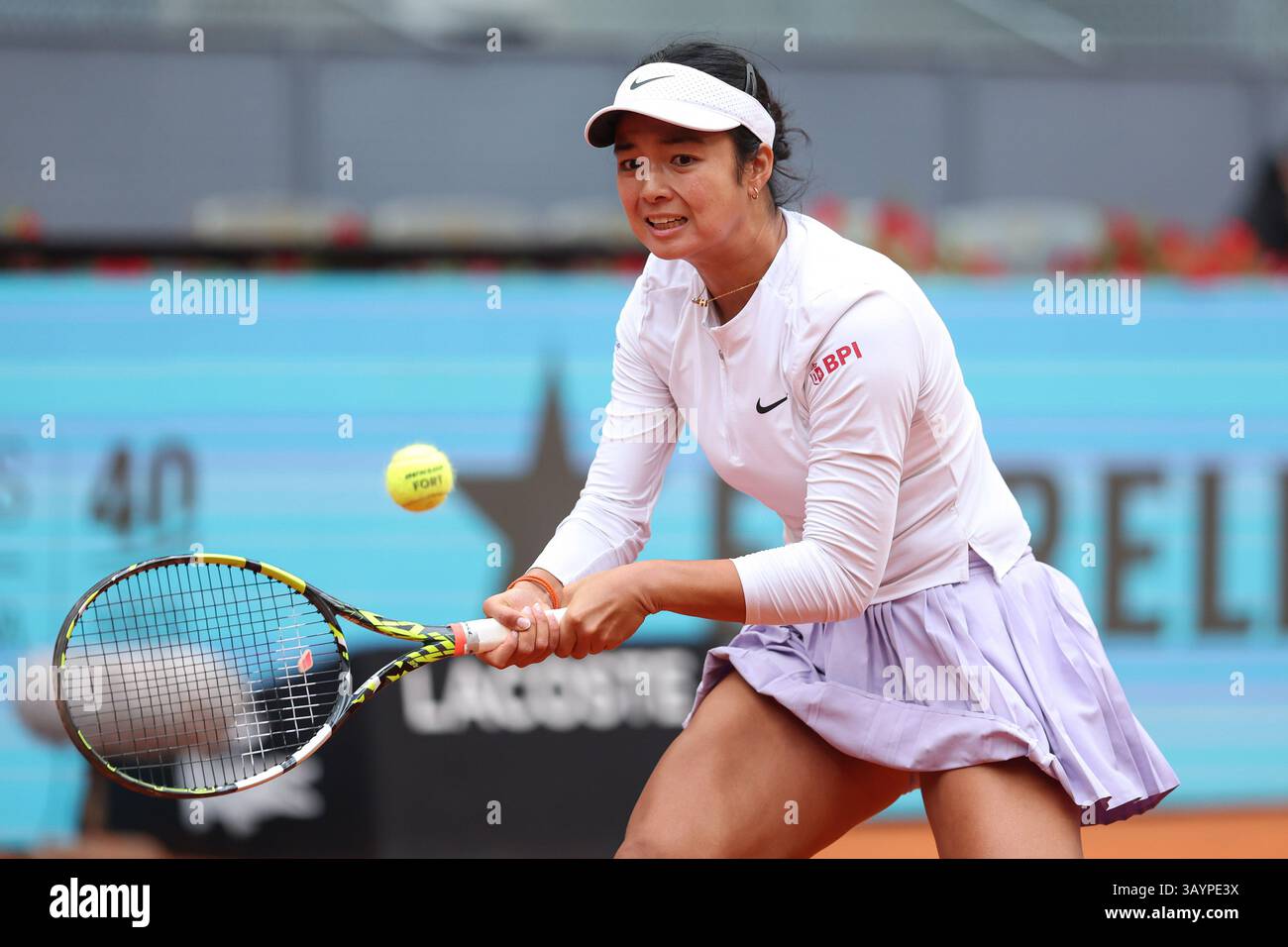 Alexandra Eala of Philippines in action against Viktoriya Tomova of Bulgaria during the Mutua ...