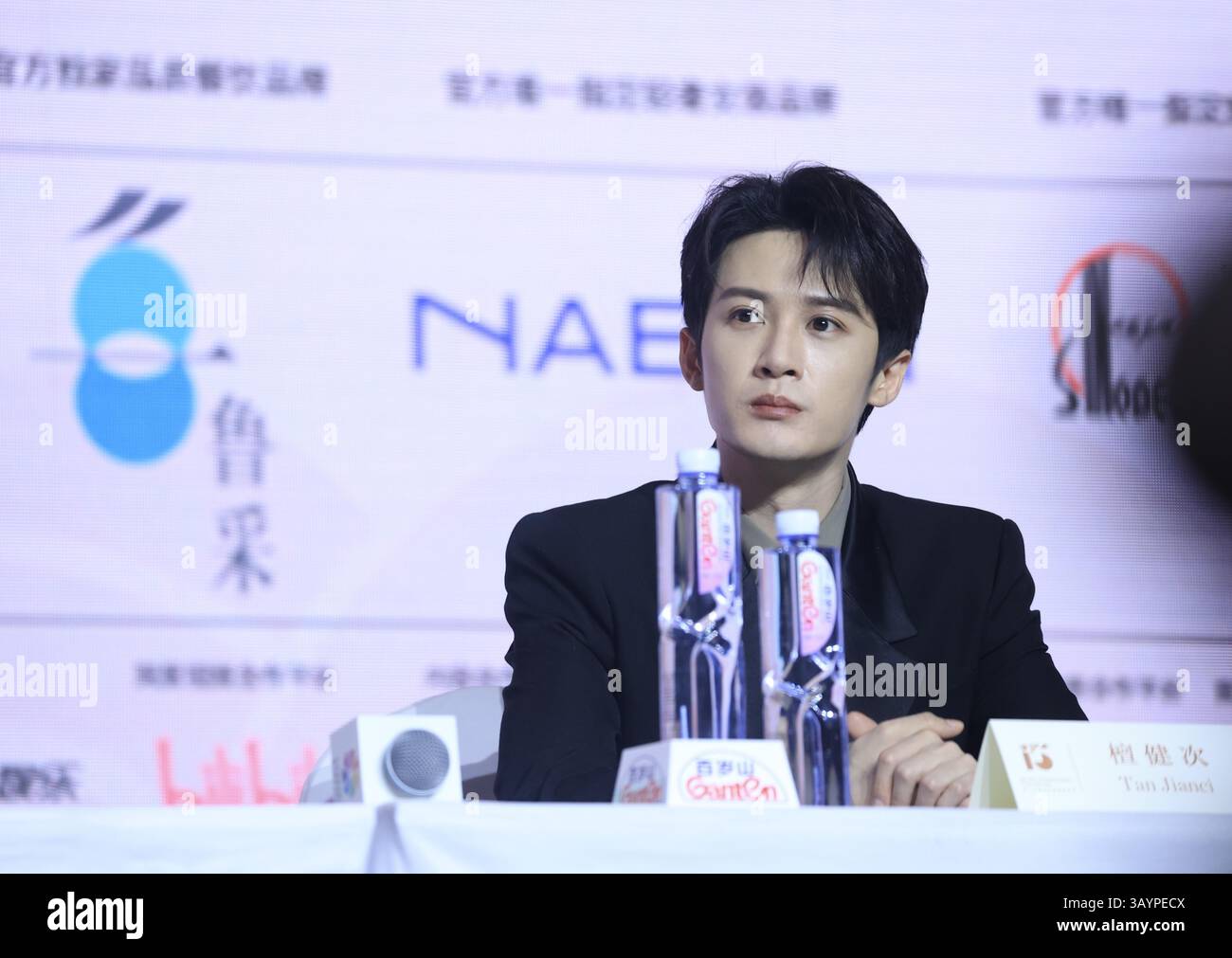 Chinese actor, singer, and dancer Tan Jianci attends an activity in ...