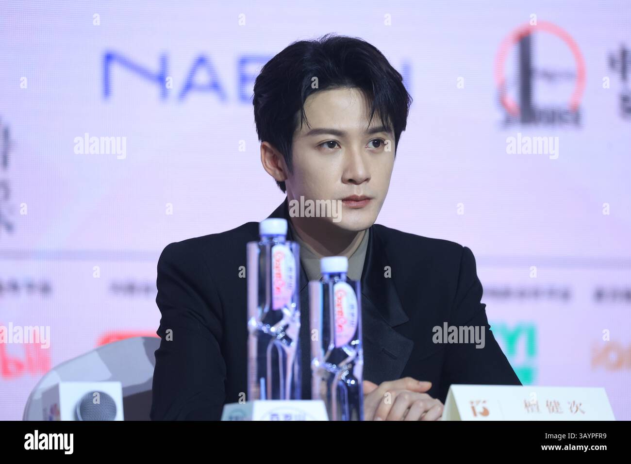 Chinese actor, singer, and dancer Tan Jianci attends an activity in ...