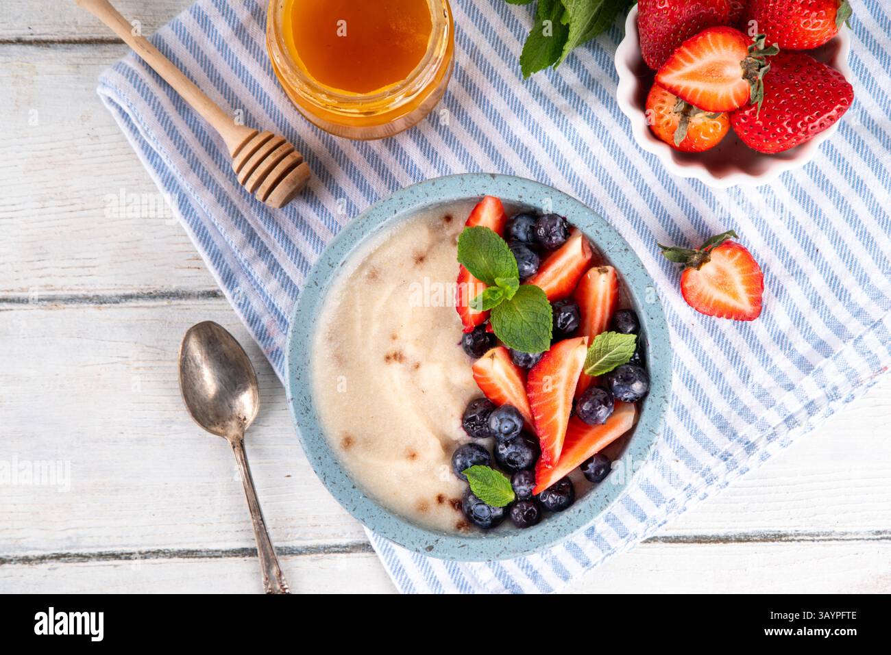 Cream of Wheat semolina porridge with fresh summer berry. Portion of ...