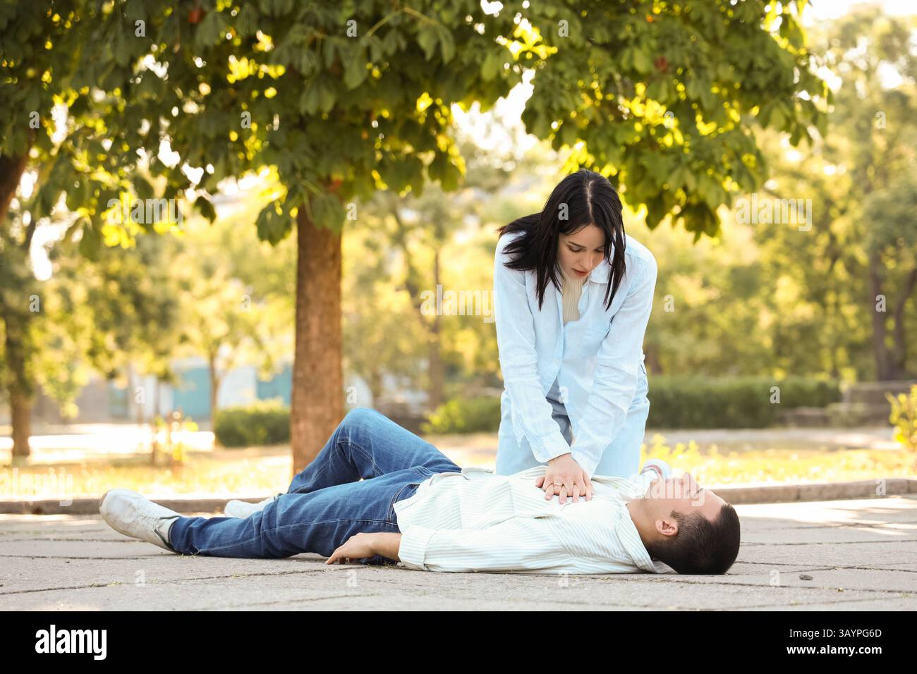 Unconscious young woman lying on hi-res stock photography and images - Alamy