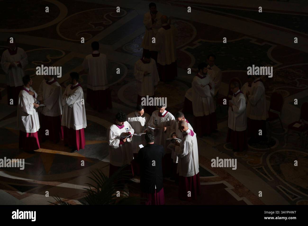 Prelates wait for the arrival of the funeral procession for Pope ...