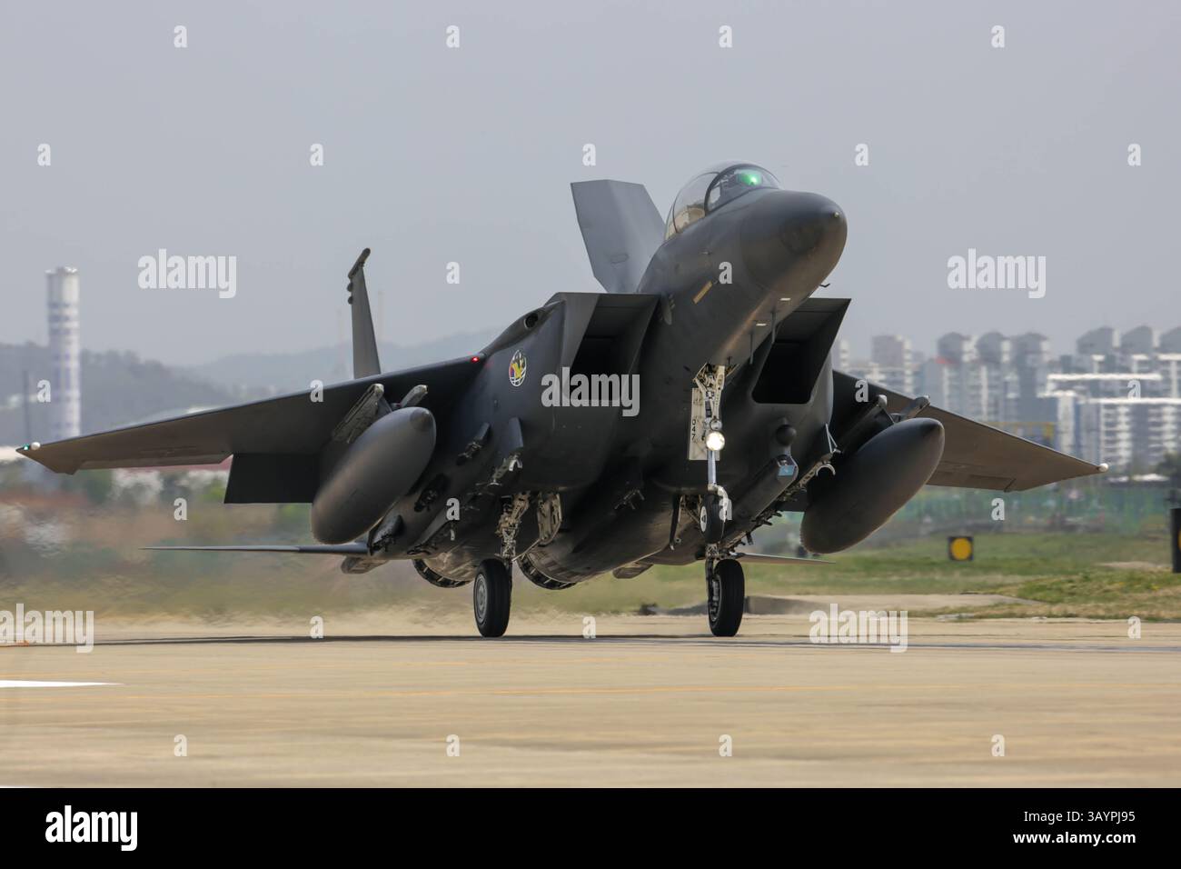 A Republic of Korea Air Force F-15K Slam Eagle aircraft lands at Gwangju Air Base, South Korea ...