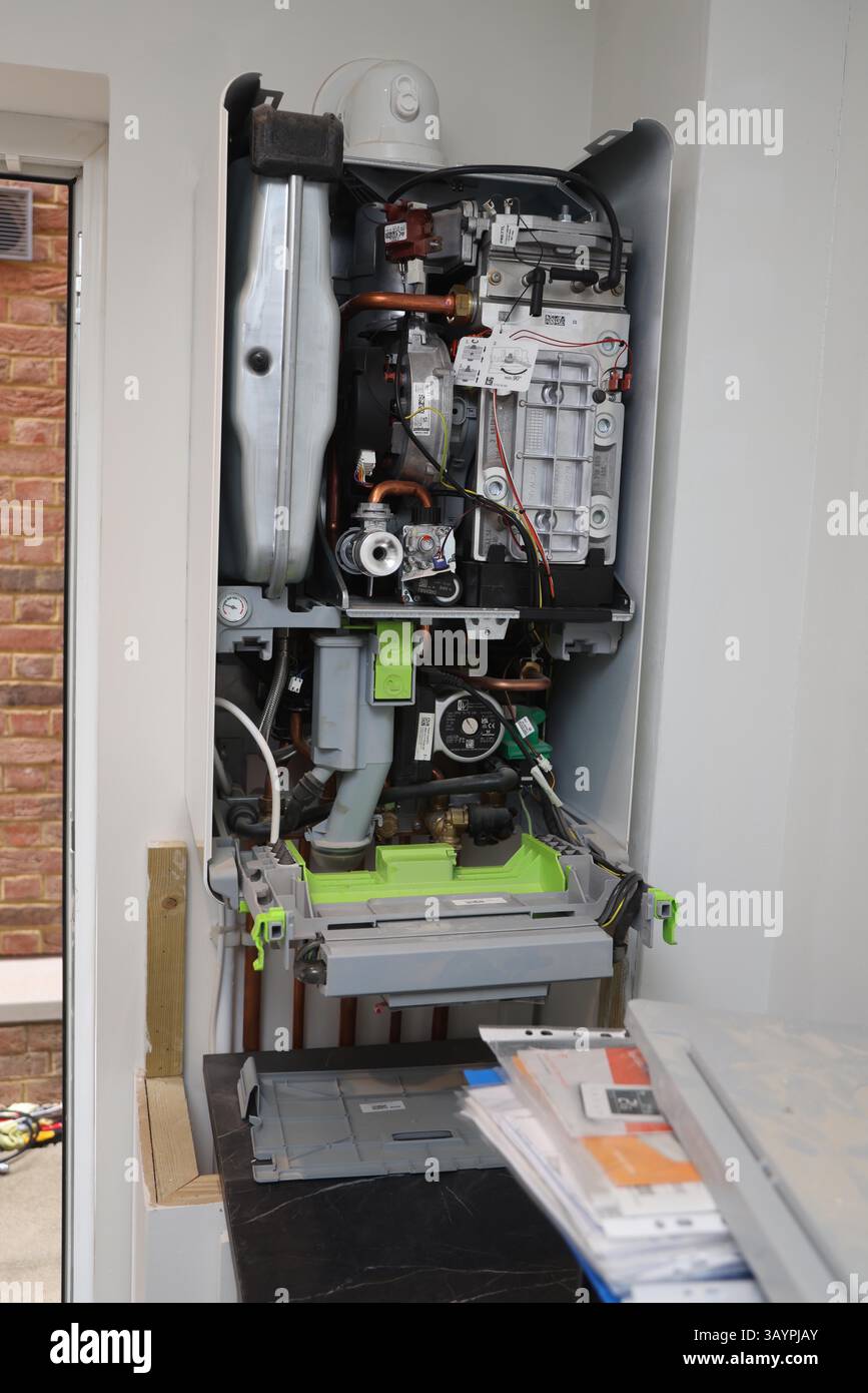 Servicing a modern Worcester gas combi boiler Stock Photo - Alamy