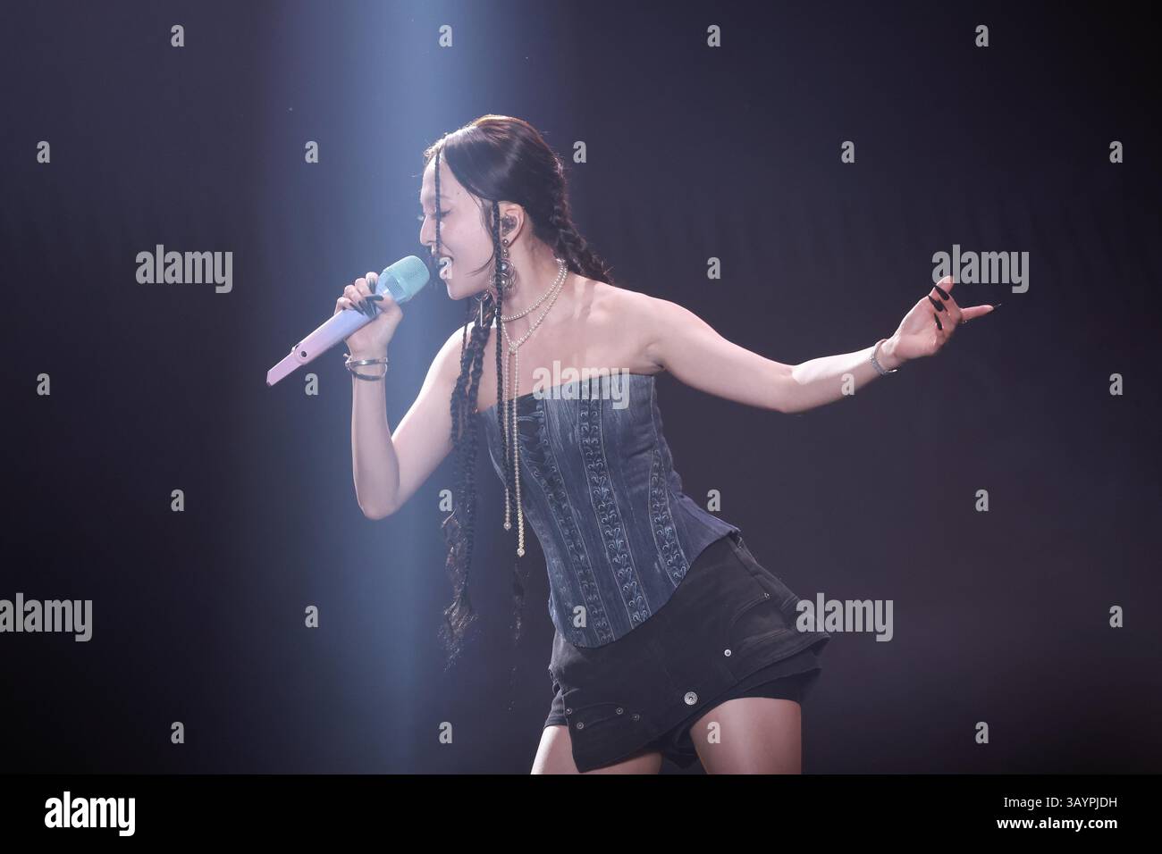 Taiwanese singer and actress Angela Zhang sings at a music festival in ...