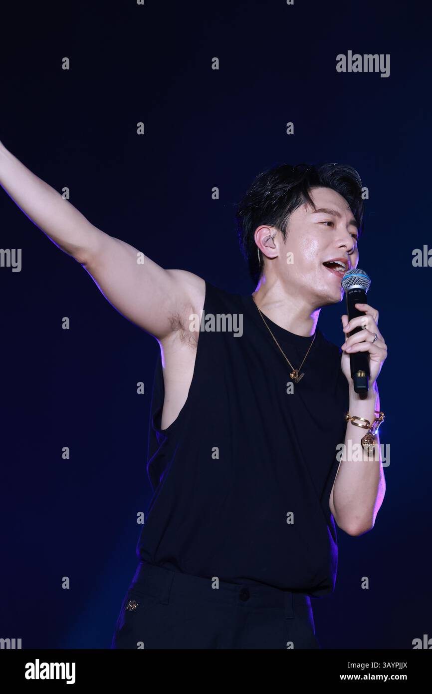 Taiwanese Mandopop and folk-rock singer-songwriter William Wei sings at ...