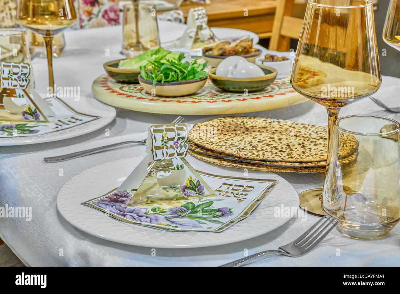 A close-up view of a traditional Passover seder plate with symbolic ...