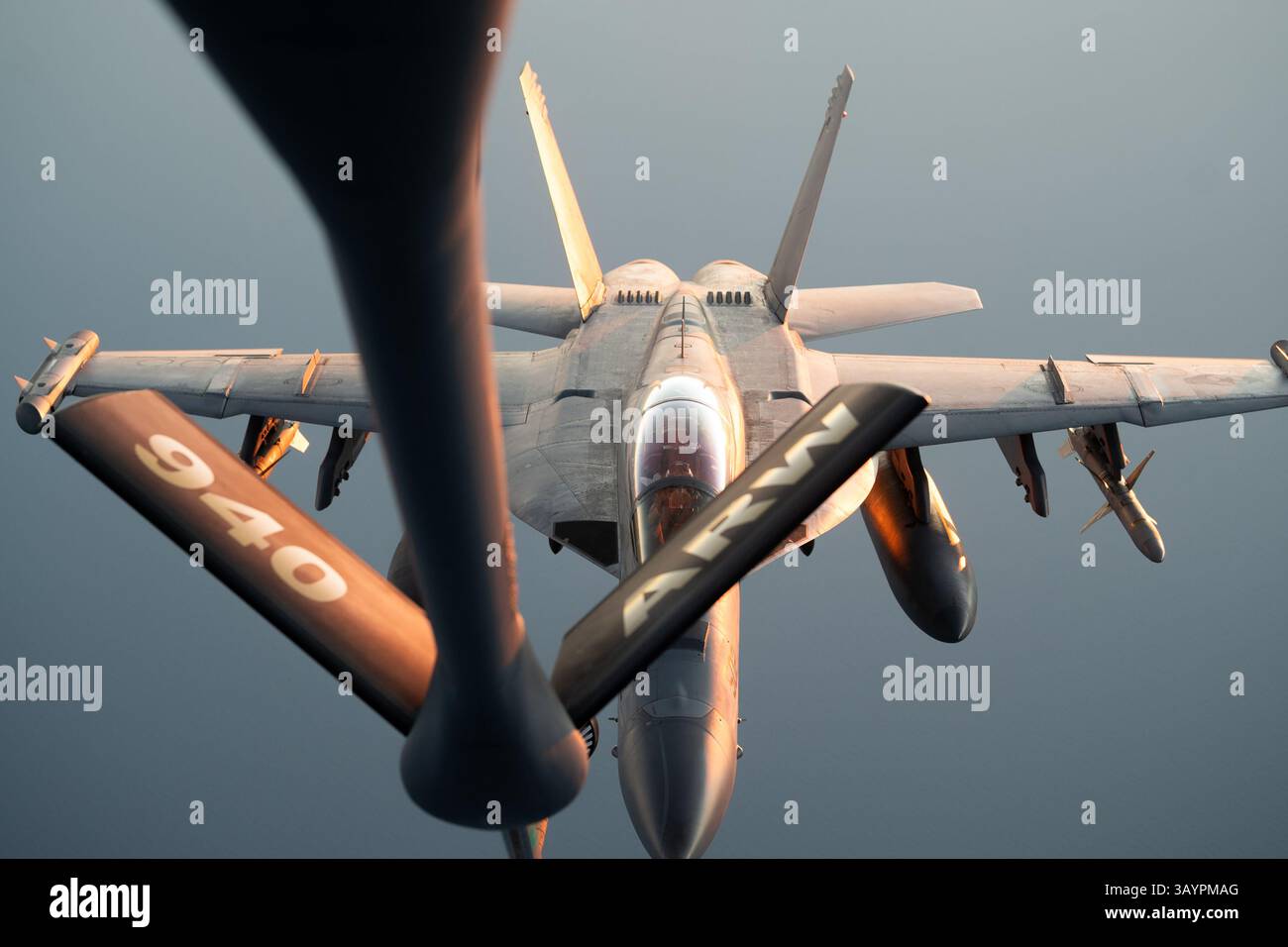 A U.S. Navy EA-18G Growler prepares to refuel from a U.S. Air Force KC ...