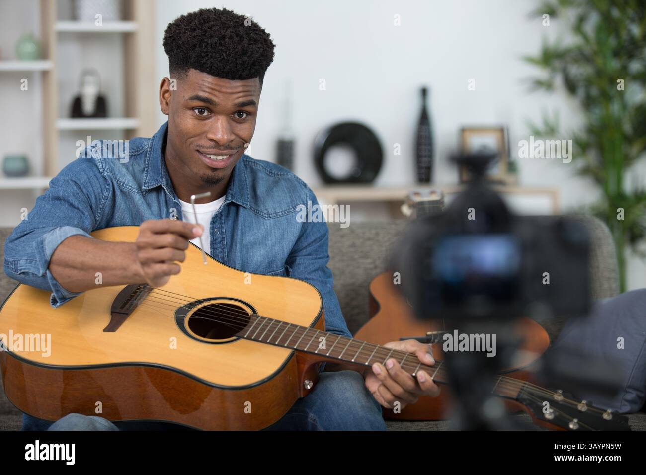 handsome man recording song vlogging concept Stock Photo - Alamy