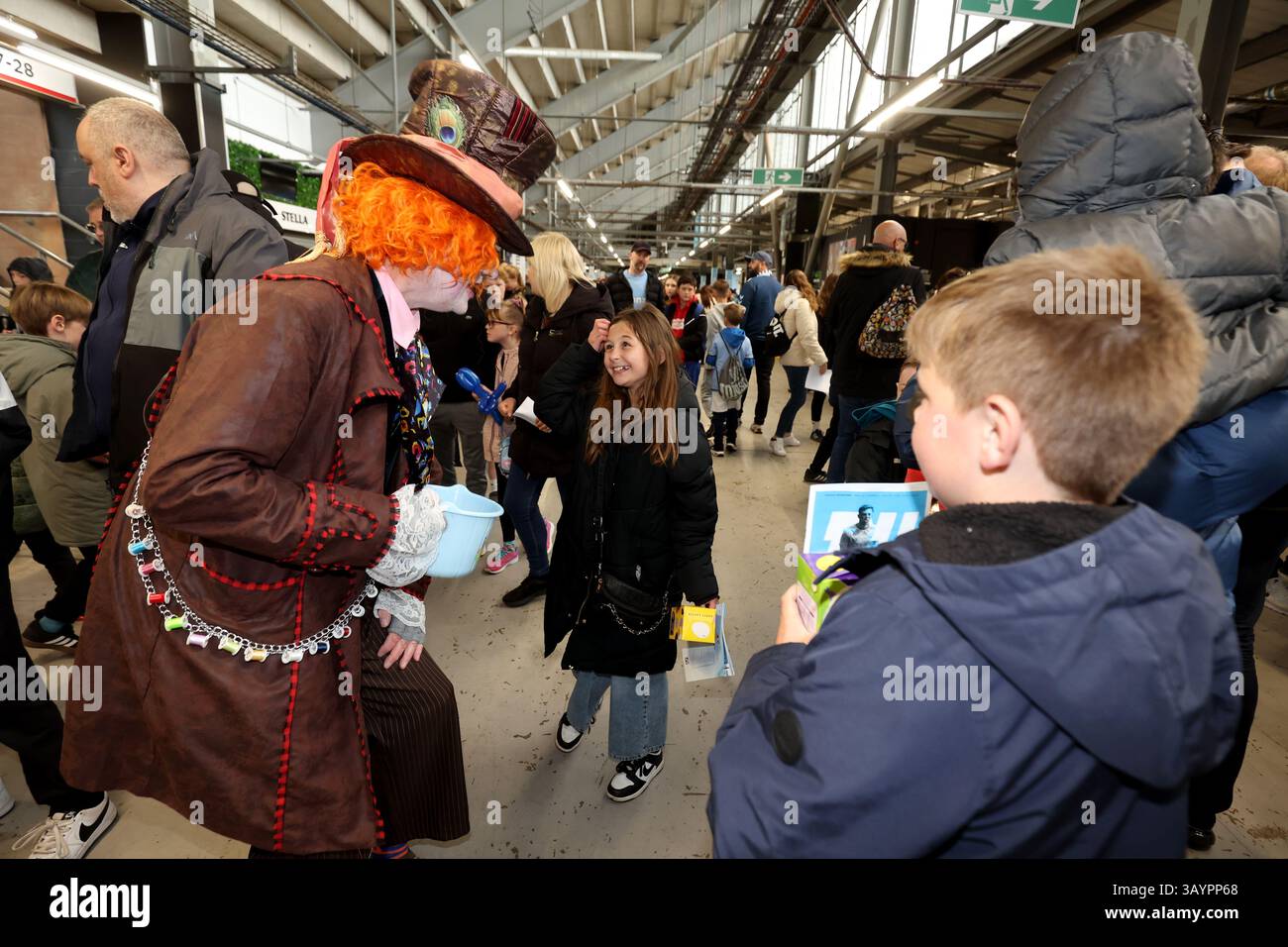 Fans enjoying activities in North Stand concourse before a training ...