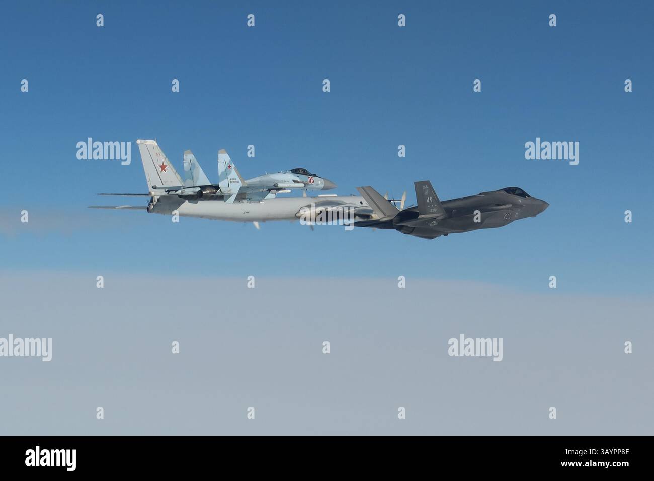 A Russian Tu-95 and a Su-35 military aircraft are positively identified ...