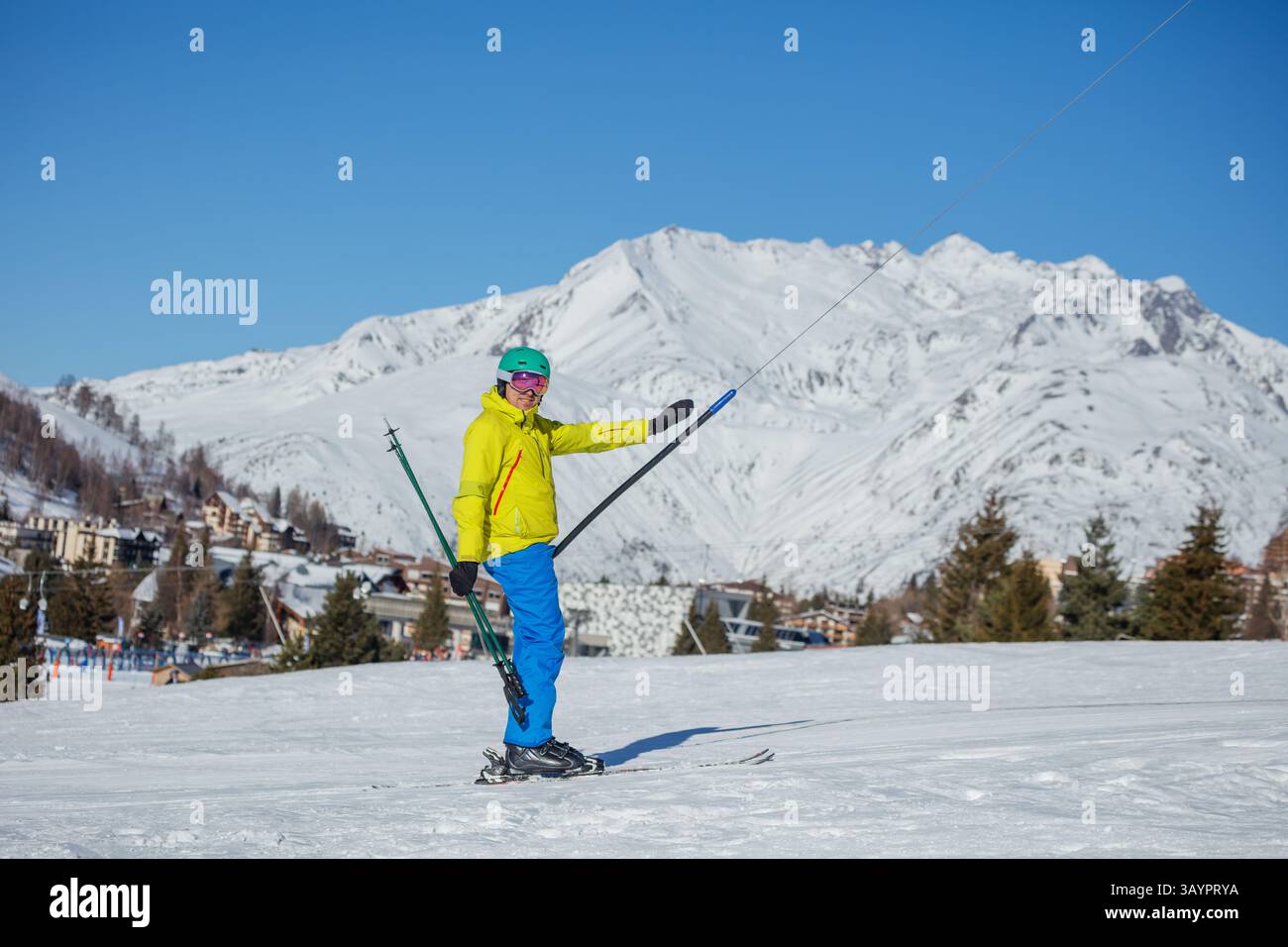 Happy skier man on the lift, ready for snowy adventures ahead Stock ...