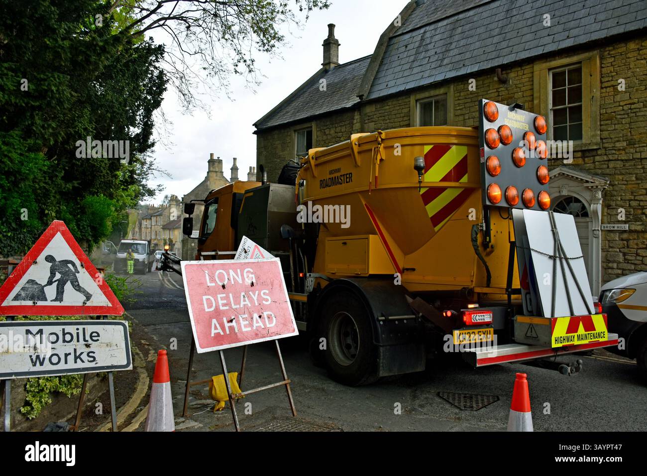 Highway Maintenance fixing potholes in road in Batheaston, Somerset, UK ...