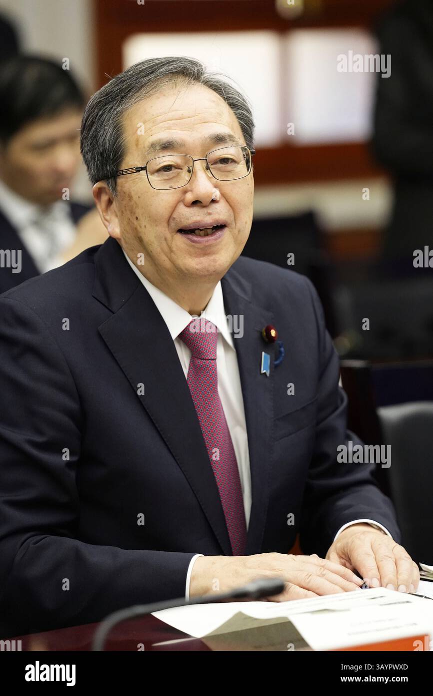 Tetsuo Saito, leader of Japan's Komeito Party meets Yang Bojiang ...