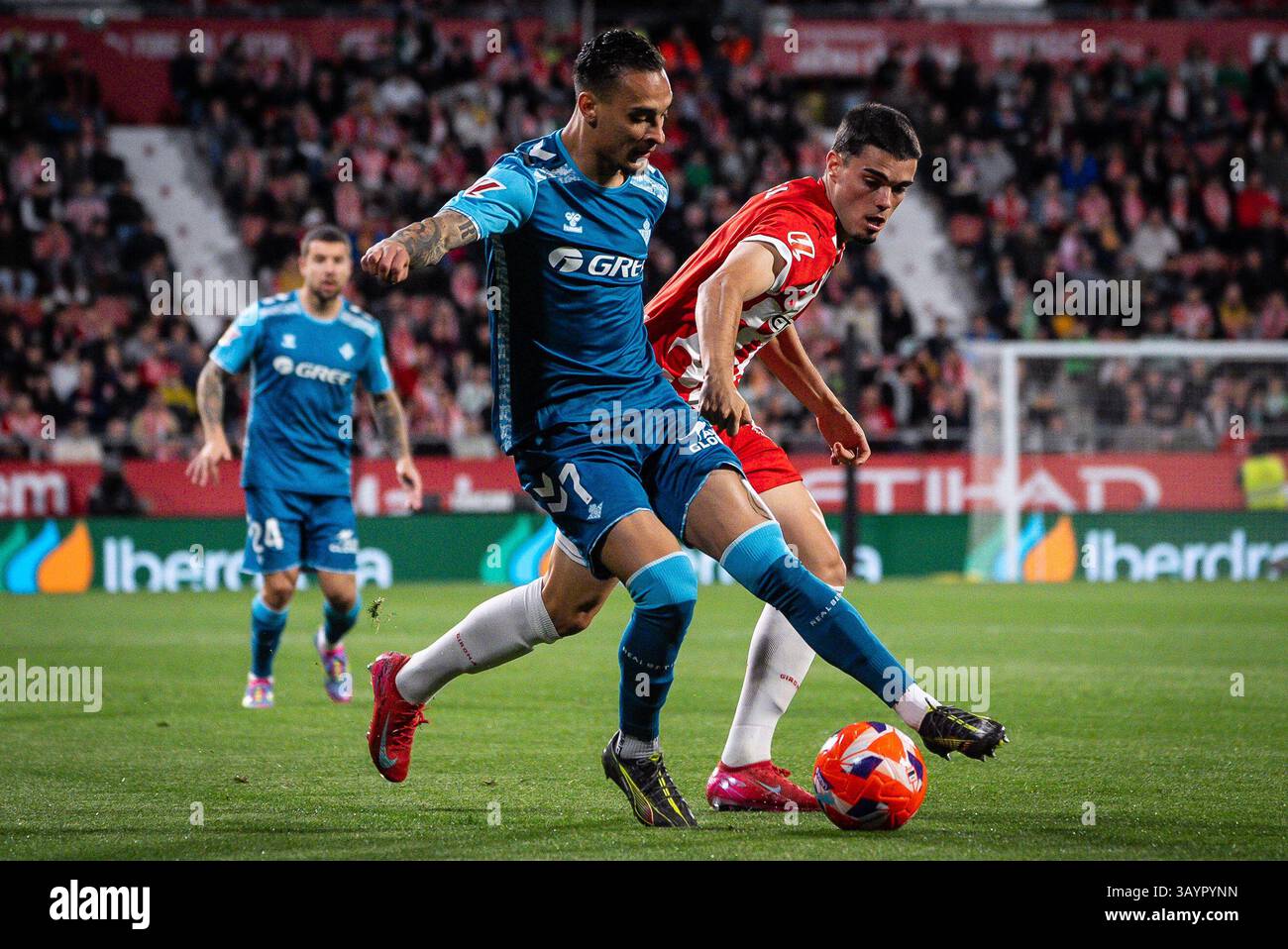 Antony MATHEUS DOS SANTOS of Real Betis and Miguel GUTIERREZ of Girona ...